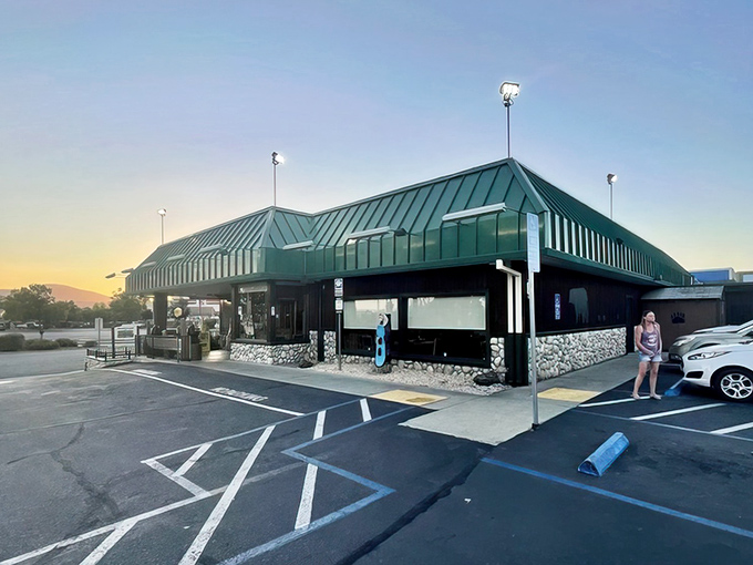 The iconic green roof of Black Bear Diner in Redding stands like a woodland beacon for hungry travelers, promising comfort food salvation just off Interstate 5.