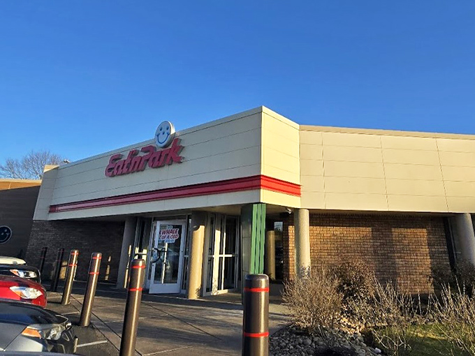 The iconic red and cream exterior of Eat'n Park stands like a beacon of comfort food promise against the Pennsylvania sky.