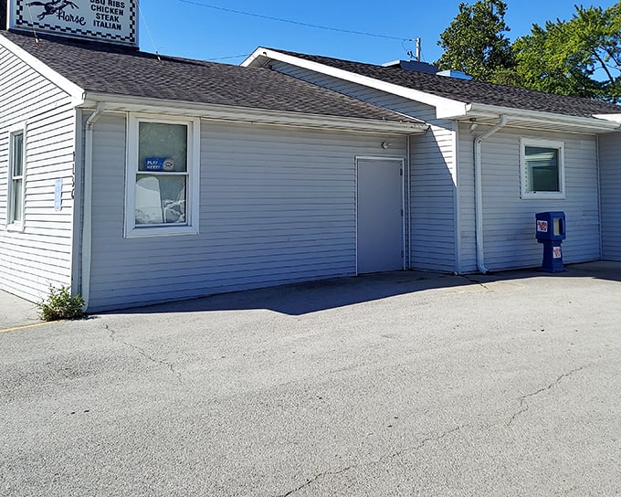 The unassuming exterior of Dark Horse Restaurant proves once again that culinary treasures often hide in plain sight.