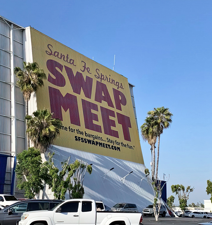 The iconic yellow and purple sign welcomes bargain hunters with a simple promise: "Come for the bargains. Stay for the fun."