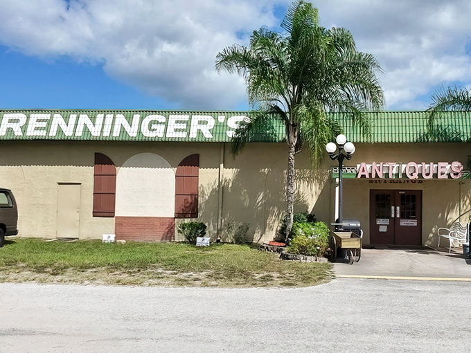 The green-roofed entrance to treasure-hunting paradise. Florida palm trees stand guard over decades of collectibles waiting inside.