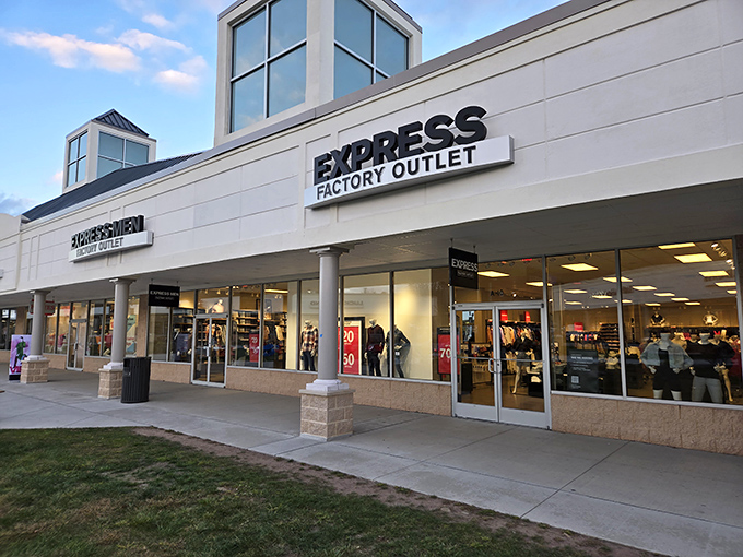 The iconic Pocono Premium Outlets sign stands tall against the mountain backdrop, promising retail adventures and wallet-friendly treasures within.