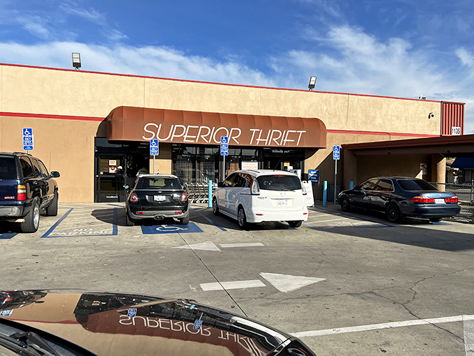 The unassuming orange awning of Superior Thrift beckons like a siren call to bargain hunters. Treasure awaits behind those doors!