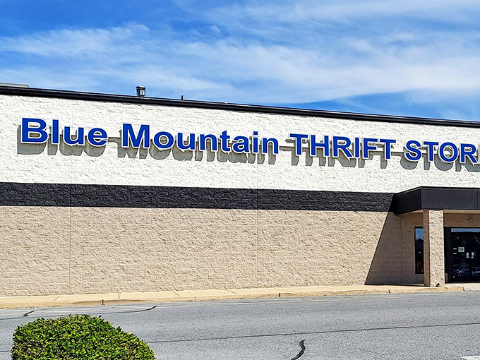 The unassuming exterior of Blue Mountain Thrift Store stands like a treasure chest waiting to be opened. No fancy frills needed when what's inside speaks volumes.