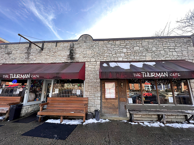 The iconic burgundy awning of The Thurman Cafe welcomes hungry pilgrims to this Columbus institution where waiting outside is part of the experience.
