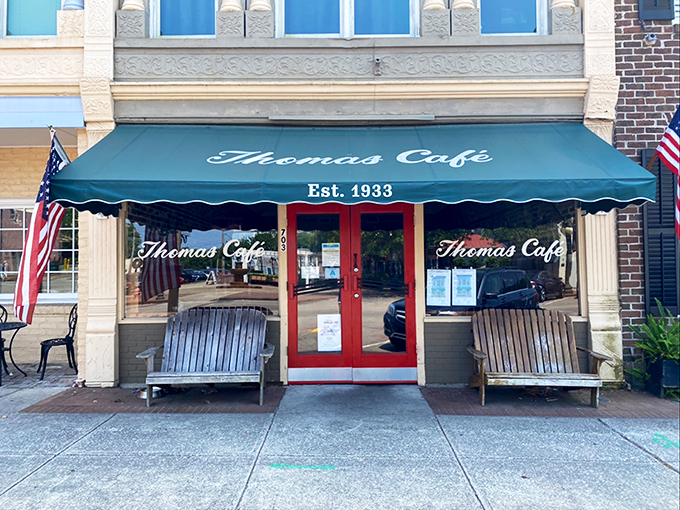 The iconic green awning of Thomas Caf&eacute; has been welcoming hungry Georgetown visitors since 1933. Small-town charm with big-time flavor awaits behind that red door.