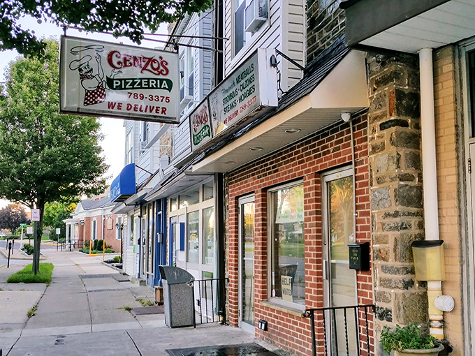 The unassuming storefront of Cenzo's Pizzeria stands like a culinary time capsule on this Havertown street, its vintage sign promising delicious treasures within.