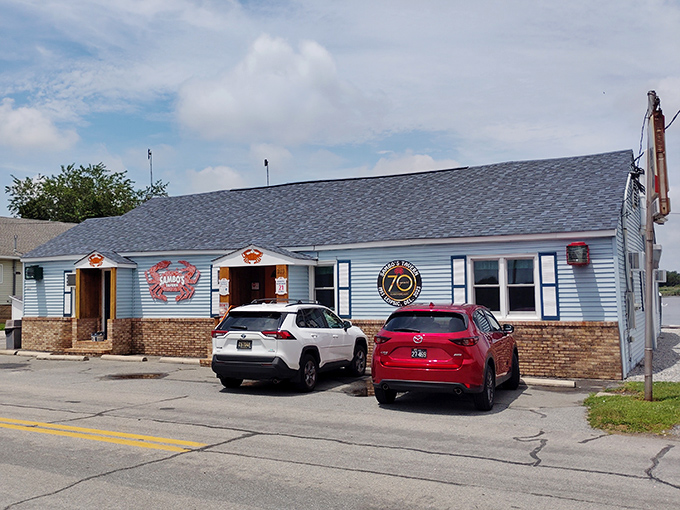 The unassuming blue clapboard exterior of Sambo's Tavern proves once again that culinary treasures often hide in plain sight.