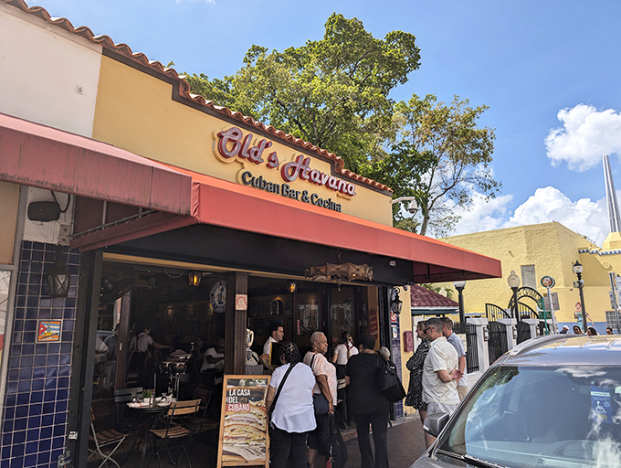 Old's Havana's sunny yellow façade and red awning beckon like an old friend on Calle Ocho, promising authentic Cuban flavors behind its modest storefront.