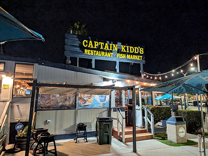 The neon yellow sign glows like a maritime lighthouse, beckoning hungry souls to this unassuming seafood haven in Redondo Beach.