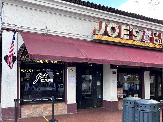 That iconic red awning and vintage signage aren't just decoration&mdash;they're a promise of the timeless comfort waiting inside Joe's Caf&eacute; on State Street.