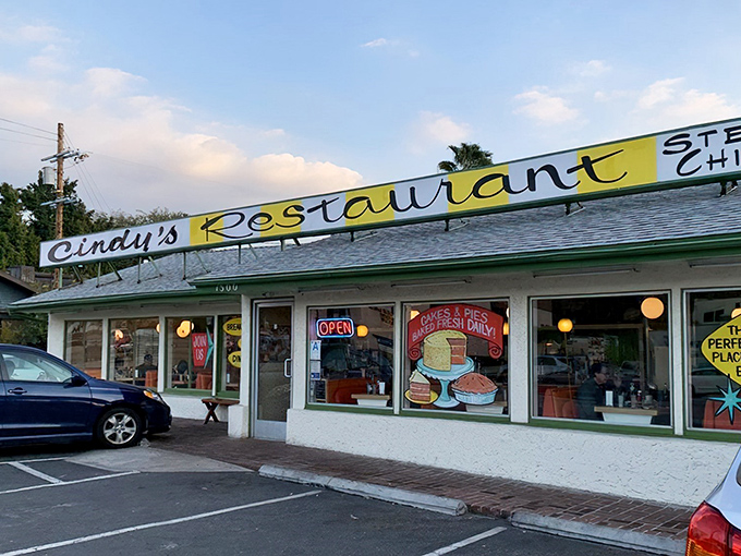 The sunshine-yellow sign beckons like a time machine to simpler days, when comfort food wasn't ironic and calories didn't count on vacation.