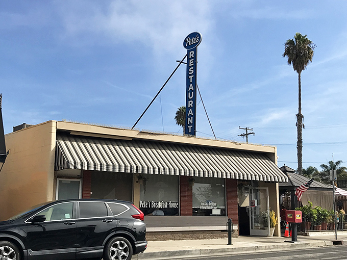 That towering blue sign isn't just advertising - it's a beacon calling hungry souls to breakfast paradise.