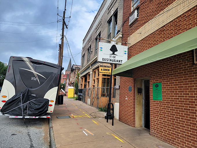 The unassuming brick exterior of H&H Restaurant in Macon hides culinary treasures within, like a Southern speakeasy for the soul-food obsessed.