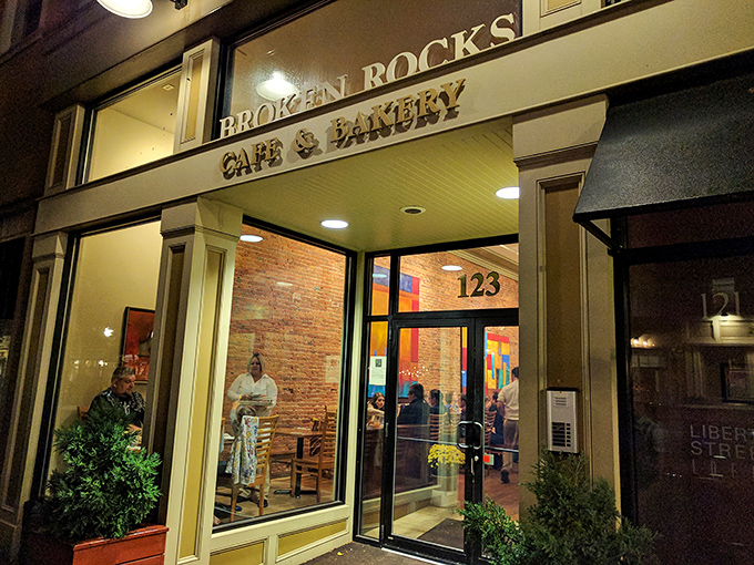 Wooster's nighttime gem beckons with warm light spilling onto the sidewalk, promising culinary adventures behind those brick walls.
