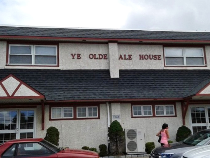 The unassuming exterior of Ye Olde Ale House stands like a humble guardian of culinary treasures, promising comfort rather than pretension.