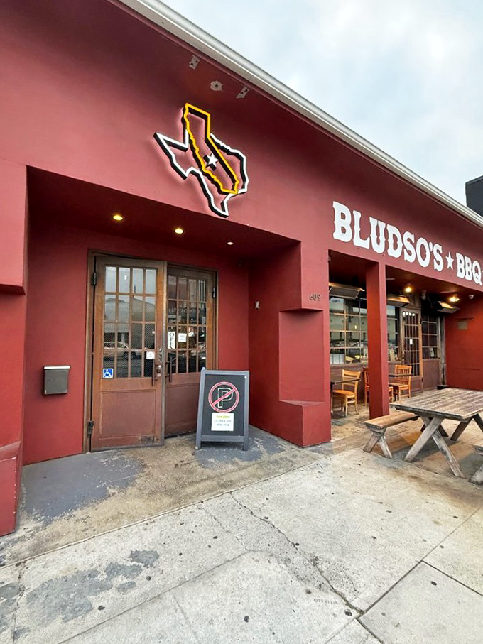 That distinctive red exterior isn't just paint – it's a beacon calling all barbecue pilgrims home.