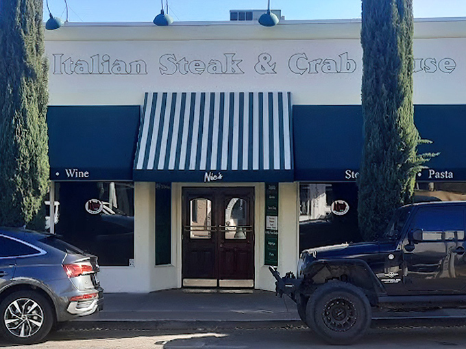 The green-striped awning beckons like an old friend, promising Italian comfort in the Arizona desert. Nic's exterior might be modest, but culinary treasures await inside.