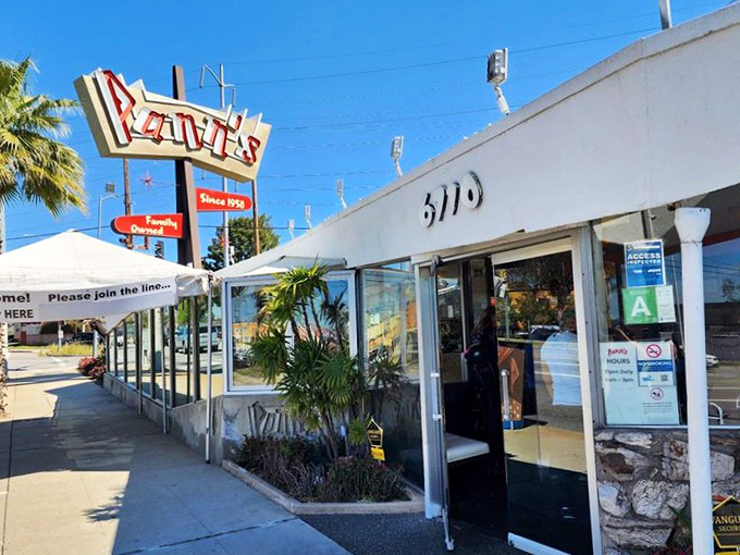That iconic neon sign isn't just calling you to breakfast&mdash;it's beckoning you back to an era when diners were social hubs and architectural statements rolled into one delicious package.