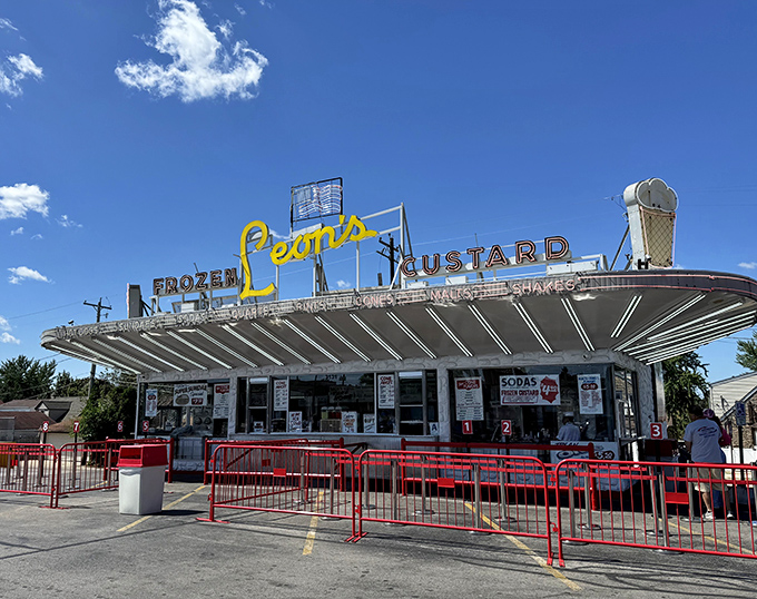 Neon dreams and custard schemes - Leon's glowing facade promises frozen perfection under Milwaukee skies.