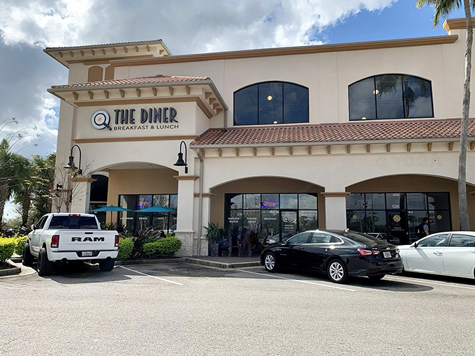 Spanish-style architecture meets breakfast paradise at @ The Diner, where Orlando's food pilgrims gather for morning magic away from the theme park madness.