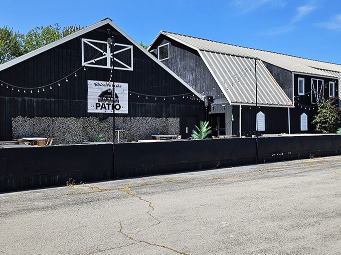 The striking black exterior with classic white trim tells you immediately: this isn't your average roadside eatery, but a culinary destination worth the drive.