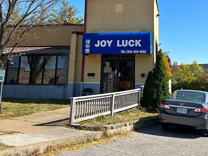The blue awning of Joy Luck stands as a beacon of culinary promise, like finding a $20 bill in an old jacket pocket—unexpected but absolutely delightful.