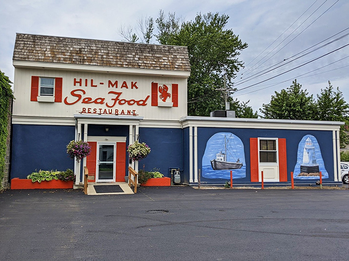 The nautical charm hits you before the first bite! Hil-Mak's blue exterior with hand-painted murals promises seafood treasures within this unassuming Ashtabula gem.
