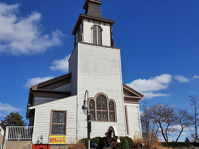 The heavenly conversion is complete! This former church now preaches the gospel of great food, with its iconic steeple standing sentinel over culinary salvation.