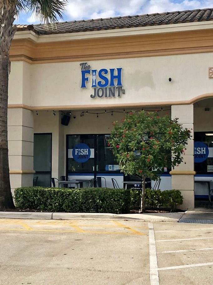 Nestled between palm trees and neighboring shops, The Fish Joint's unassuming strip mall location is Florida's version of a culinary speakeasy.