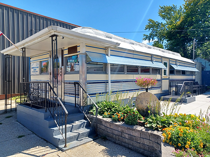 The classic railcar silhouette of Lawrence Park Dinor stands proudly on Main Street, its vintage sign promising comfort food salvation to hungry Erie residents. 