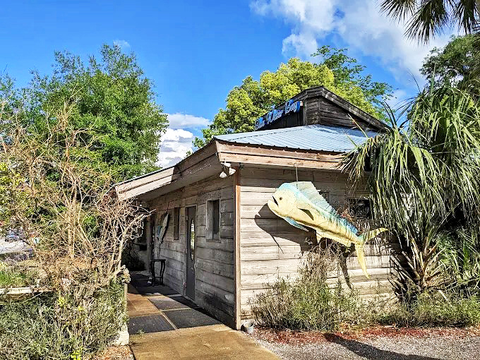 Don't let the humble exterior fool you – this weathered wooden building with its quirky fish sculpture houses seafood treasures that would make Neptune himself jealous.