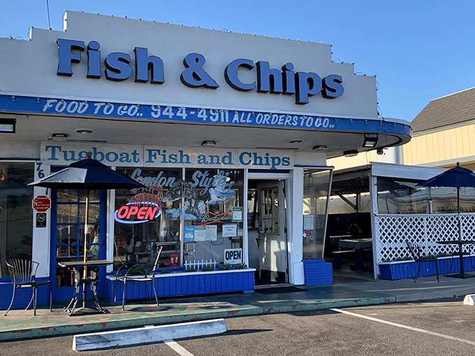 The blue-trimmed facade of Tugboat Fish & Chips stands out like a cheerful maritime beacon in Carmichael. No pretense, just the promise of seafood perfection.