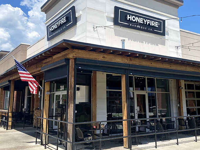 HoneyFire's welcoming exterior combines modern design with rustic charm, like a barbecue joint that went to architecture school but still remembers its roots.