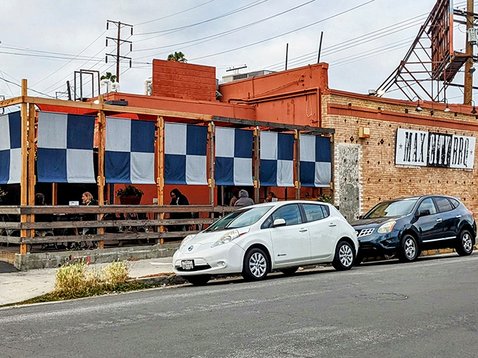 The blue and white checkered awnings of Max City BBQ beckon like a smoke signal to hungry Angelenos seeking authentic barbecue bliss.