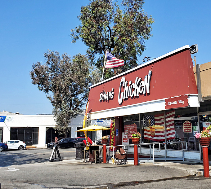 That iconic red exterior isn't just a building—it's a beacon of hope for the hungry. The "BREAKFAST" banner promises salvation at any hour.