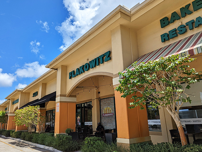 The unassuming exterior of Flakowitz belies the culinary treasures within. Like finding a Rolex in a cereal box, this strip mall gem delivers big on flavor.