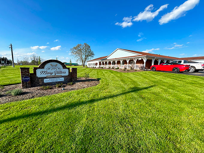 Welcome to potato paradise! Mary Yoder's classic white exterior and covered porch promise the kind of comfort food that makes life worth living.