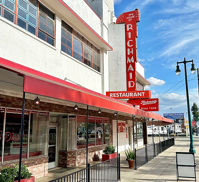 That iconic red neon sign against Lodi's blue sky isn't just advertising &ndash; it's a beacon of hope for hungry travelers seeking authentic diner magic.