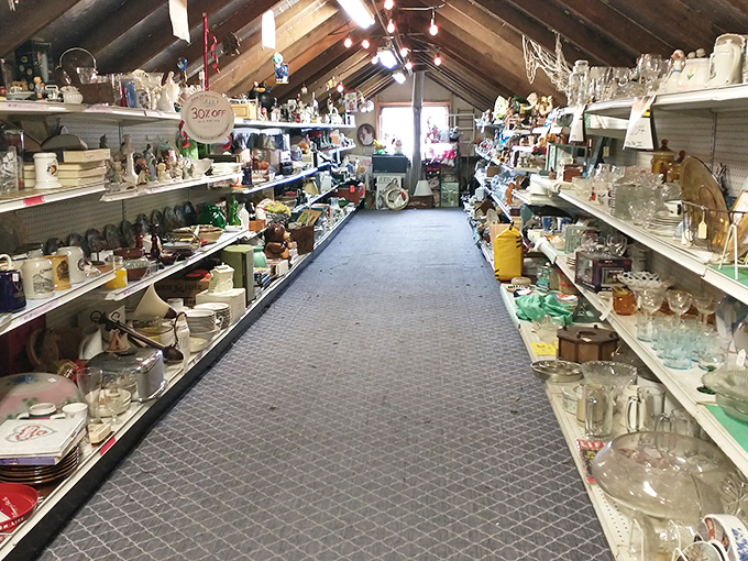 Treasure hunters, prepare yourselves! This aisle stretches into what feels like infinity, shelves brimming with glassware and collectibles waiting to tell their stories.