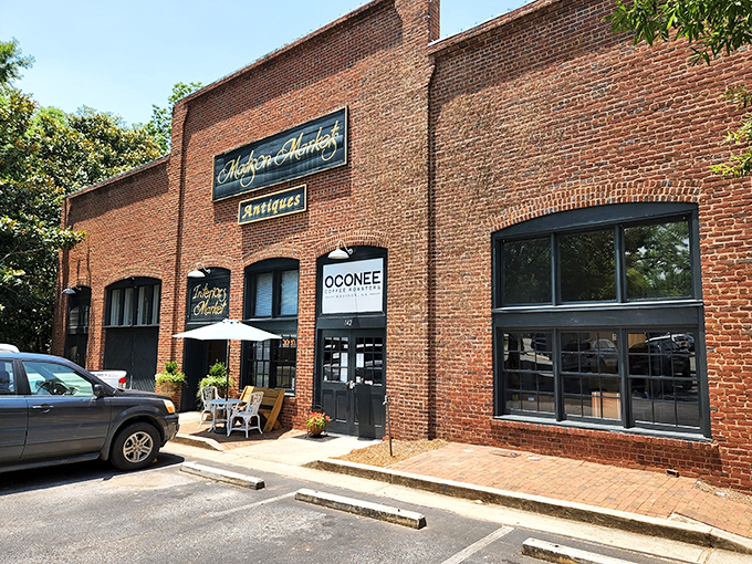 The historic brick fa&ccedil;ade of Madison Markets welcomes treasure hunters with elegant gold lettering and the promise of discoveries waiting inside.