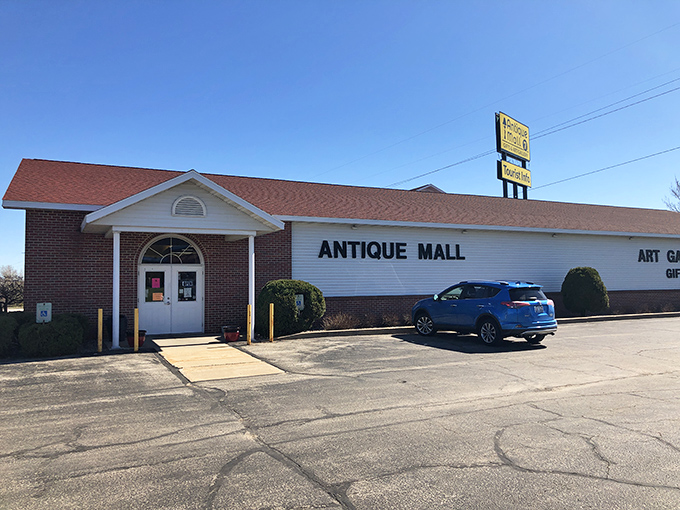 The unassuming exterior of Antique Mall of Tomah belies the wonderland of treasures waiting inside. Like a time machine disguised as a strip mall storefront.