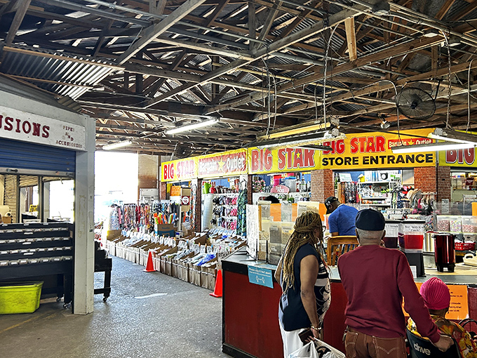 The iconic red barn entrance beckons like a siren song to bargain hunters. This is where weekend treasure hunting begins!