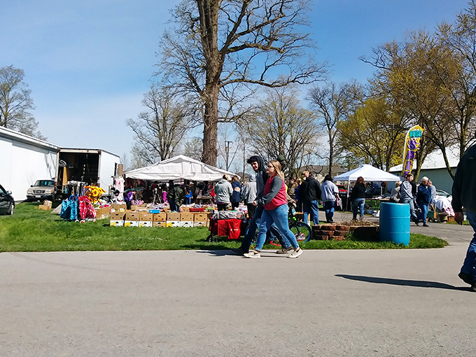 Welcome to treasure hunter paradise! The Tiffin Flea Market's entrance beckons with promises of discoveries waiting just beyond those white buildings.