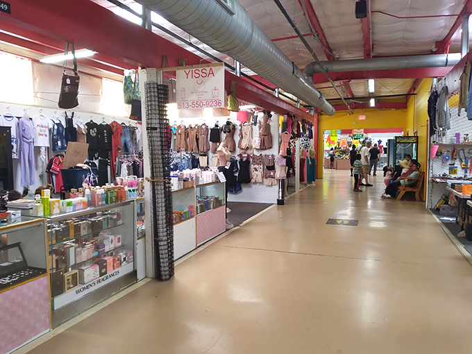 The covered outdoor section at Treasure Aisles welcomes bargain hunters with colorful benches and an eclectic array of merchandise from bikes to baby strollers.