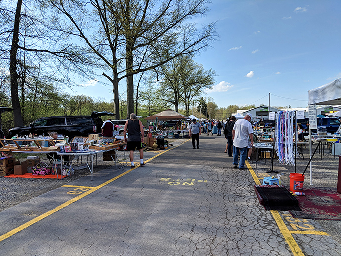 The treasure hunt begins! Outdoor vendors line the pathways at Jamie's Flea Market, where one person's castoffs become another's prized discoveries.