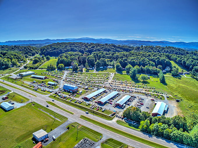 A treasure hunter's paradise from above! The Jonesborough Flea Market sprawls across acres of East Tennessee countryside, with the misty Appalachian Mountains creating a perfect backdrop.