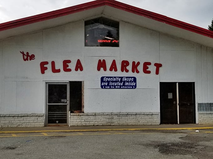 The unassuming exterior of Jefferson Flea Market promises little but delivers a universe of treasures behind those humble doors.