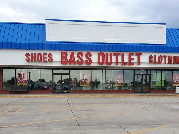 The iconic blue roof of Sikeston Factory Outlet Stores stands like a retail oasis in Missouri, promising treasure hunts where Wrangler meets wallet-friendly.