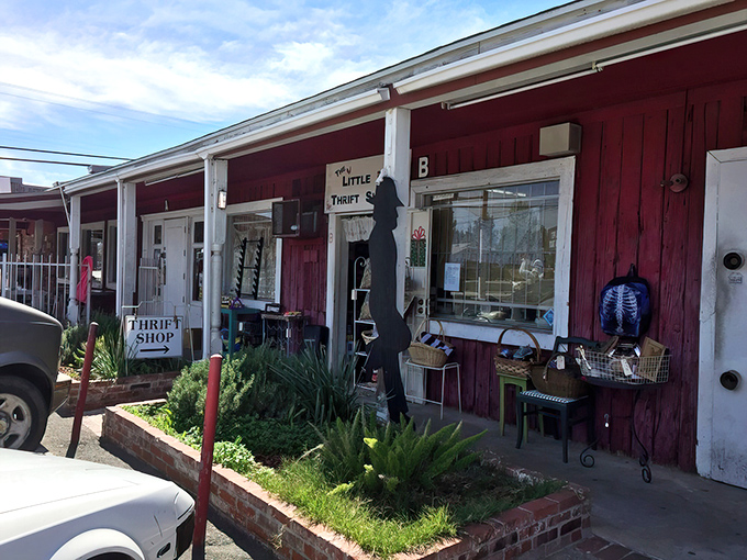 The crimson facade of Little Red Thrift Shoppe beckons like a siren call to treasure hunters. This unassuming exterior hides a labyrinth of wonders within.